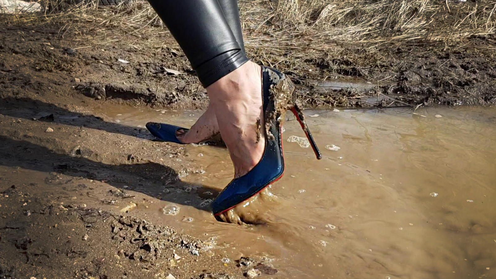 Louboutin in deep and slippy mud, high heels in puddles, heels abused ...