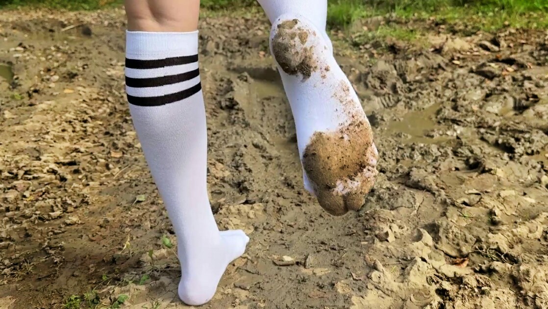 White knee high socks in mud, black stockings in mud, muddy feet, girl ...