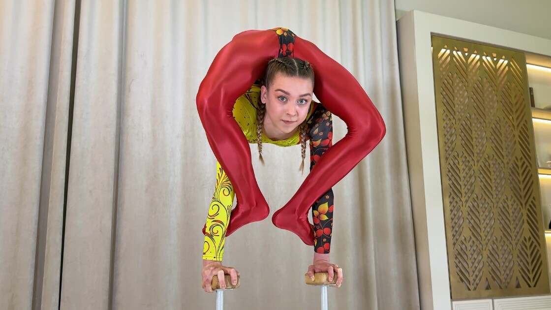 Bending in Bold: A Vivid Display of flexibility skill by Darina ...